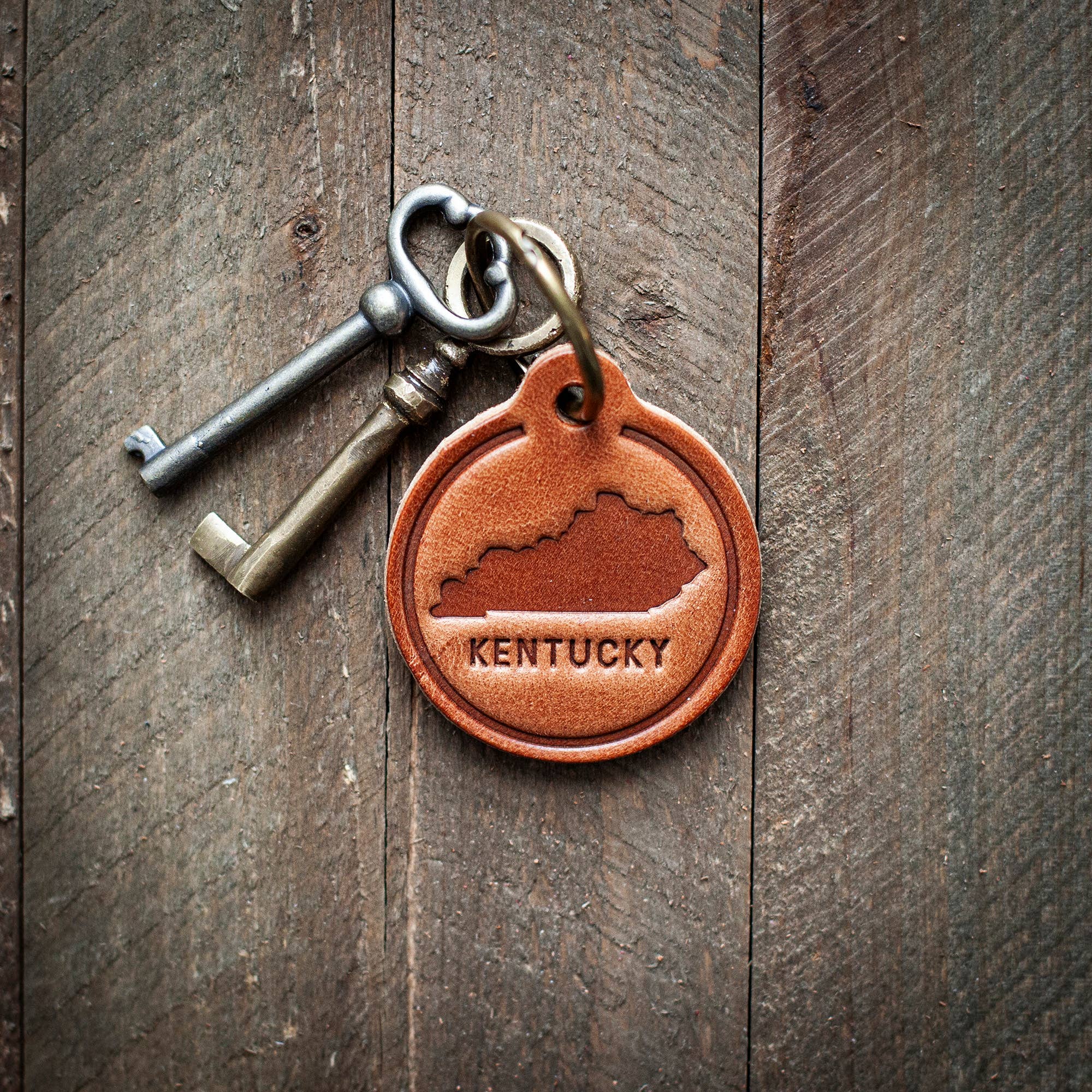 Kentucky State Silhouette Leather Keychain Circle – NO PLACE LIKE HOME ...